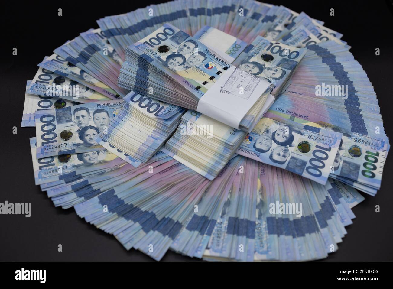 A pile of one thousand Philippines banknotes. Cash of Thousand dollar ...