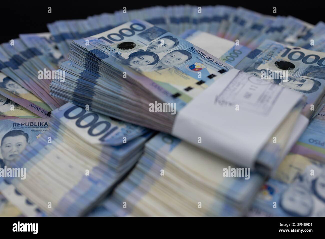 A pile of one thousand Philippines banknotes. Cash of Thousand dollar ...