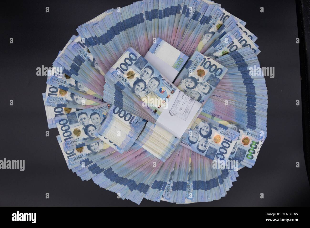 A pile of one thousand Philippines banknotes. Cash of Thousand dollar ...