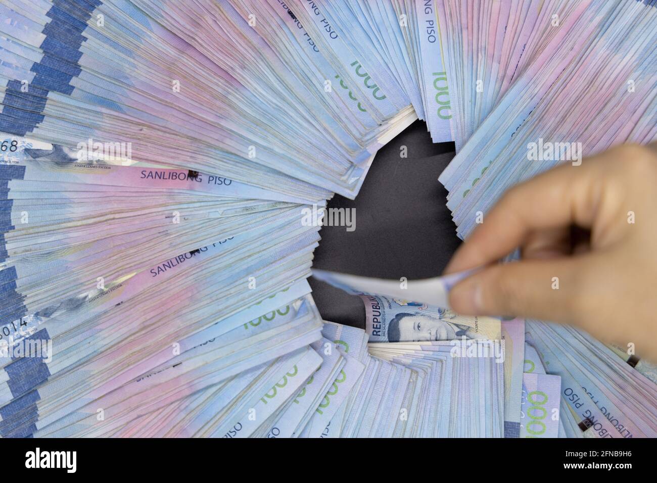 A pile of one thousand Philippines banknotes. Cash of Thousand dollar ...