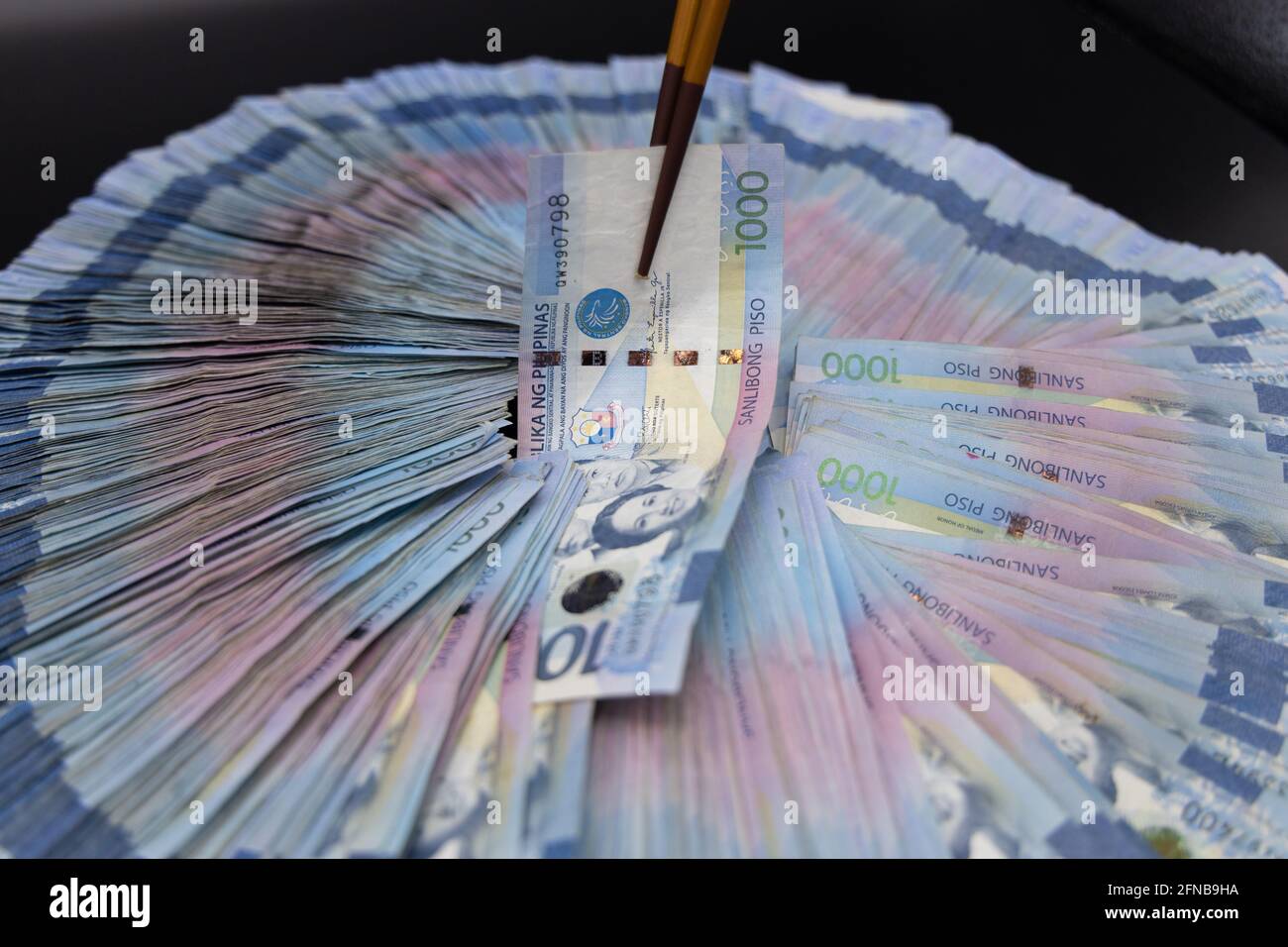 A pile of one thousand Philippines banknotes. Cash of Thousand dollar ...