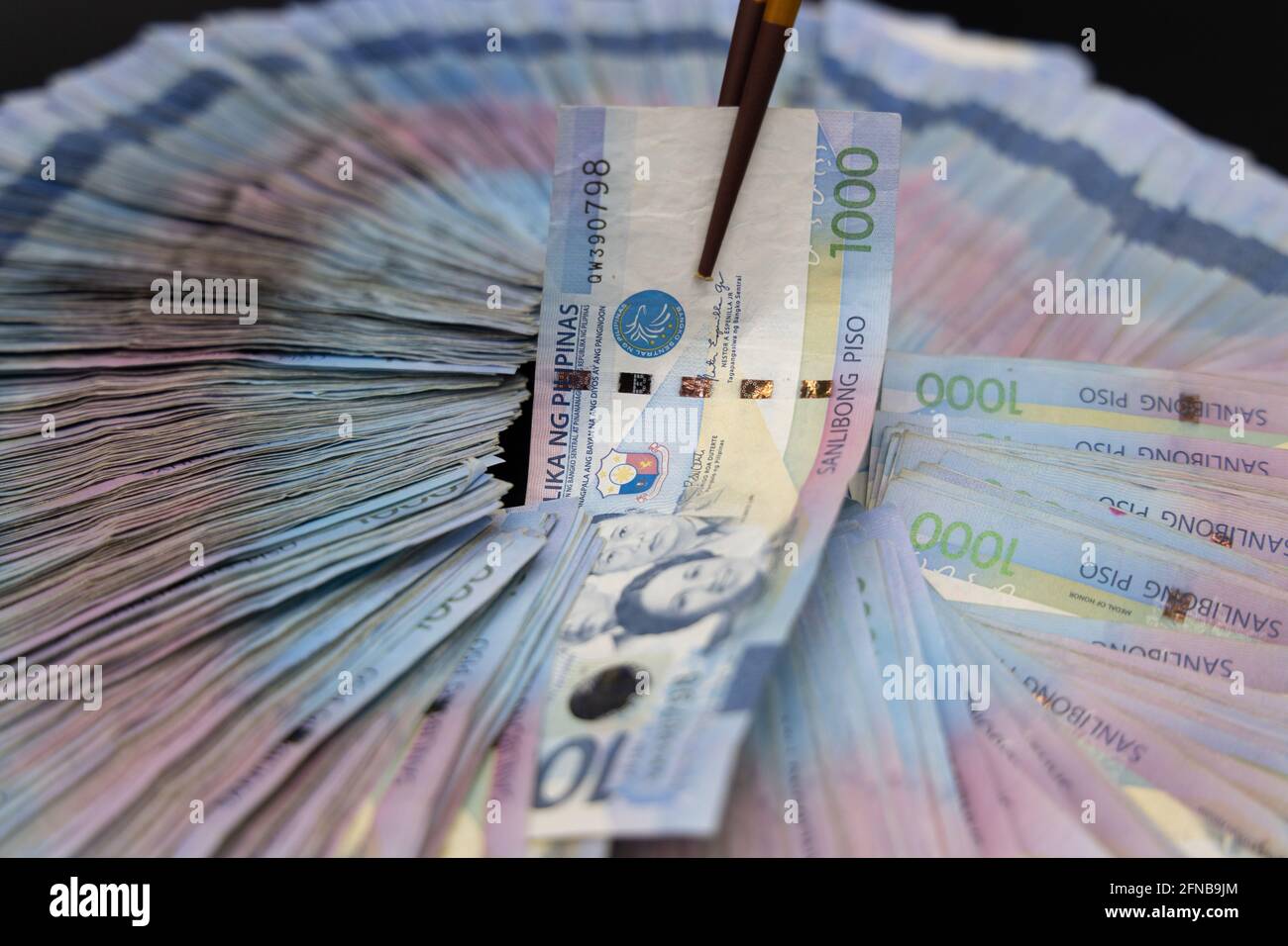 A pile of one thousand Philippines banknotes. Cash of Thousand dollar ...