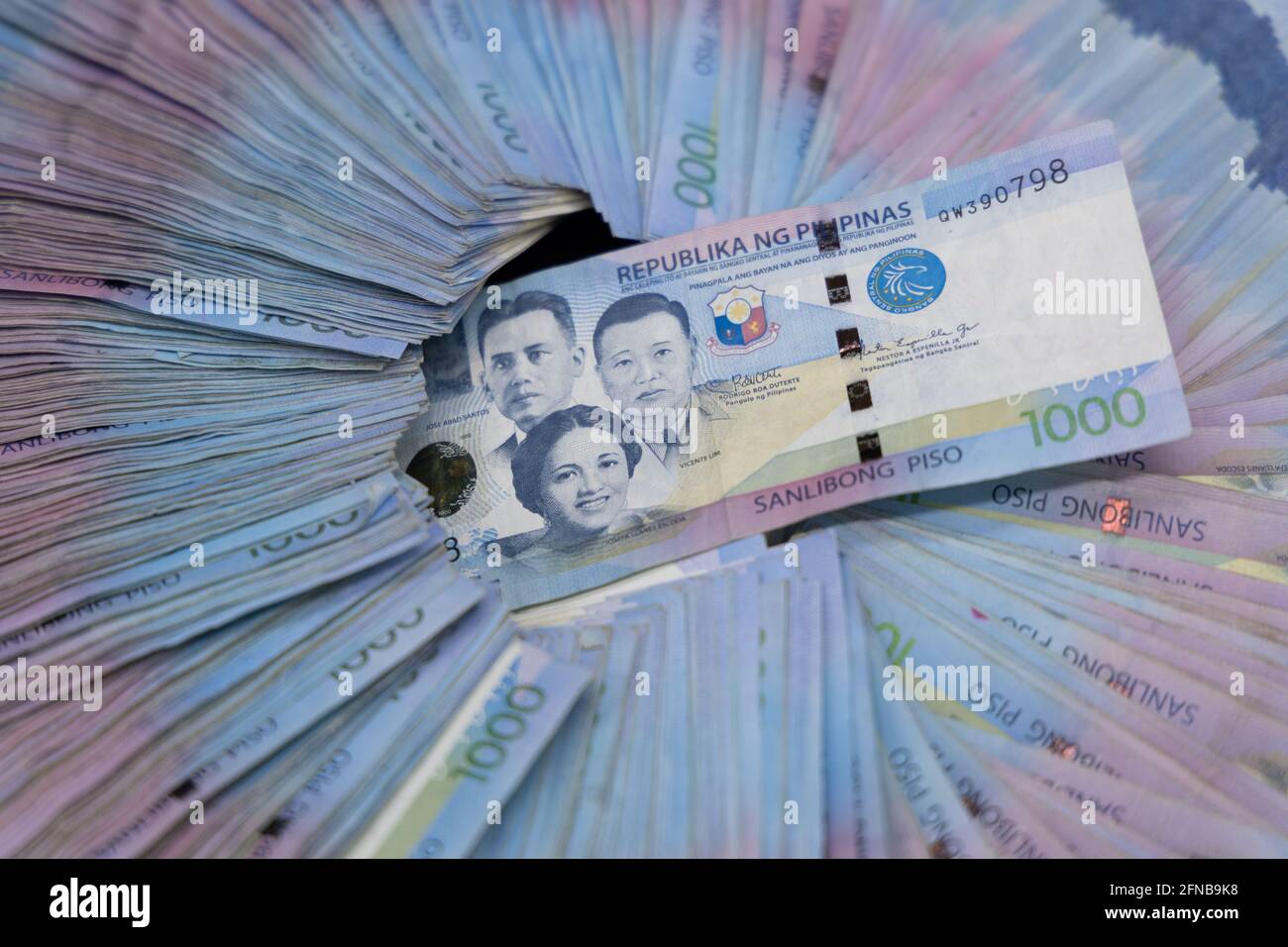 A pile of one thousand Philippines banknotes. Cash of Thousand dollar ...