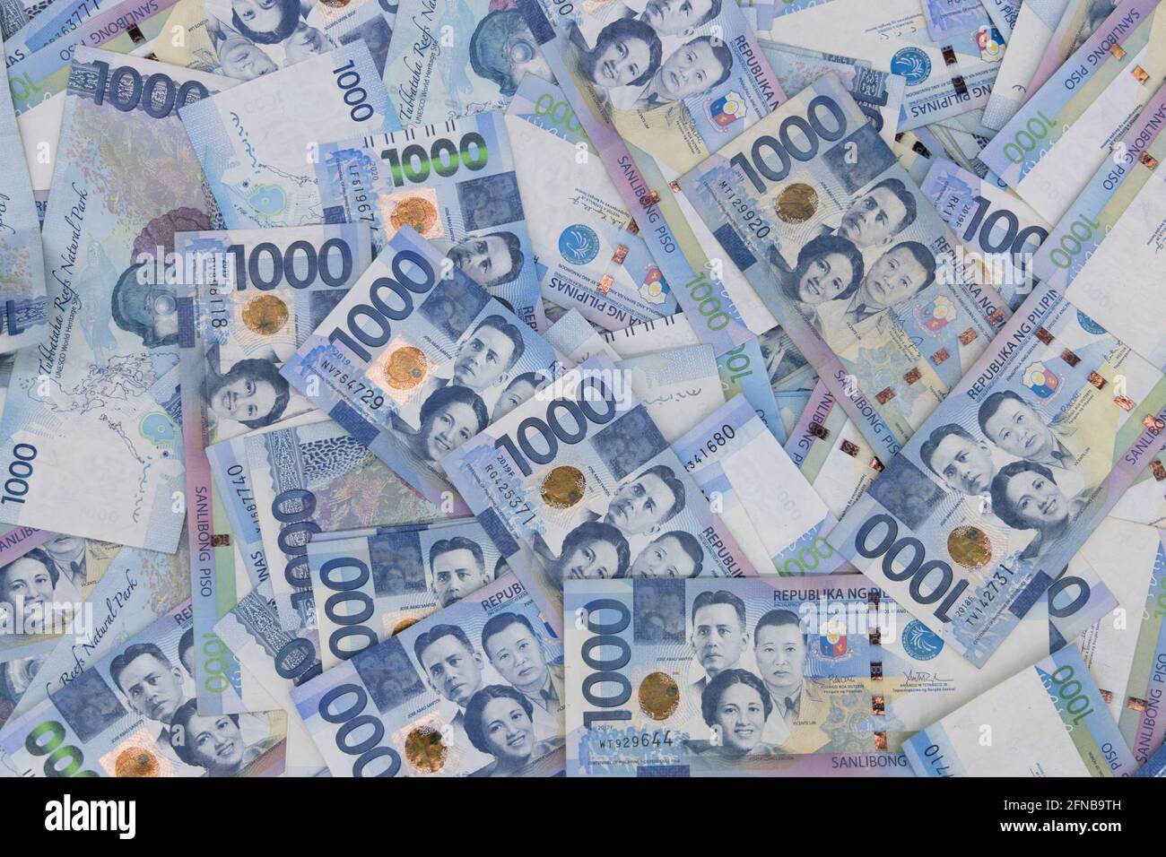 A pile of one thousand Philippines banknotes. Cash of Thousand dollar ...