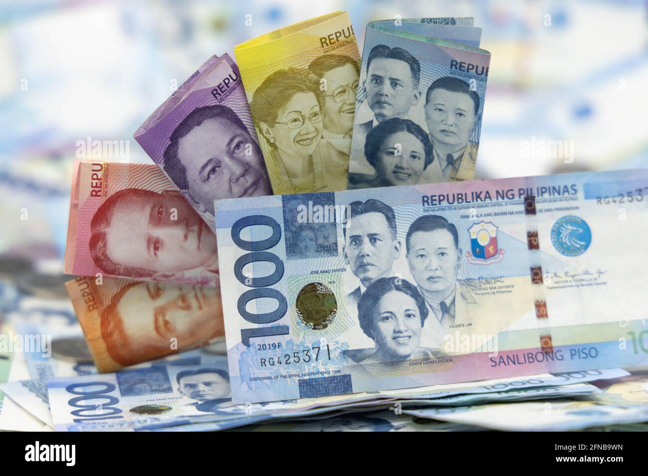 Various Philippine banknotes background images Stock Photo - Alamy