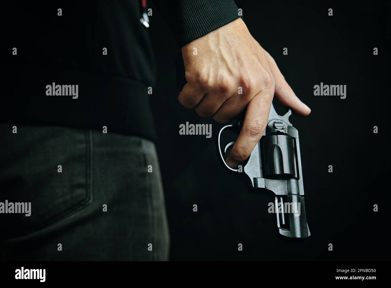 Mans Hand Holding Gun High Resolution Stock Photography and Images - Alamy