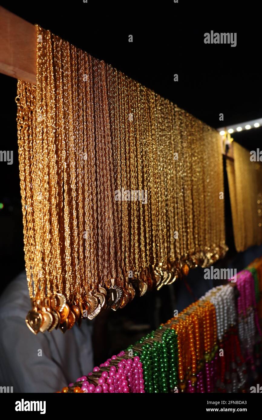 Golden neck chain hi-res stock photography and images - Alamy
