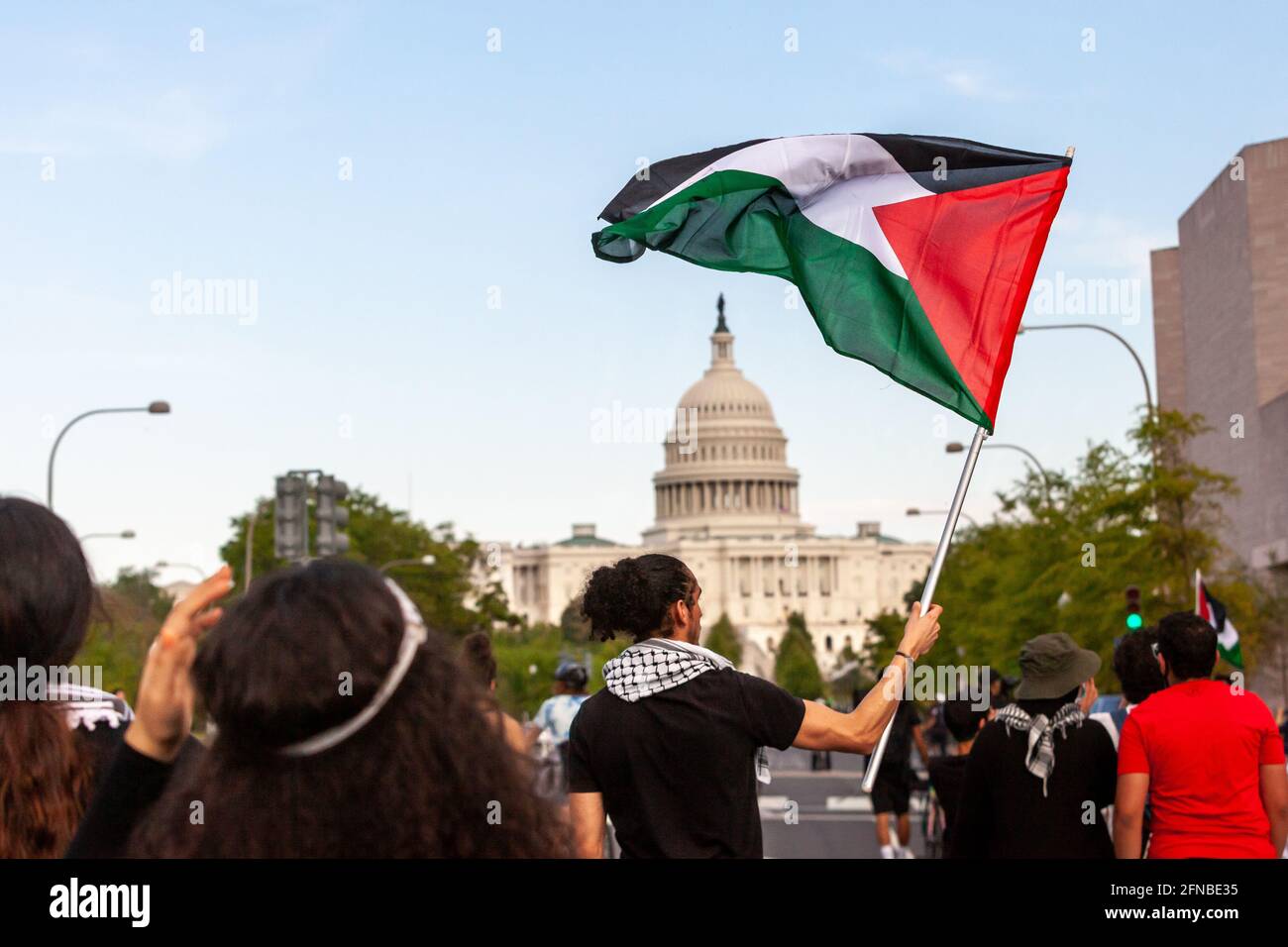 Washington, DC, USA. 15th May, 2021. Pictured: A protester in front of ...