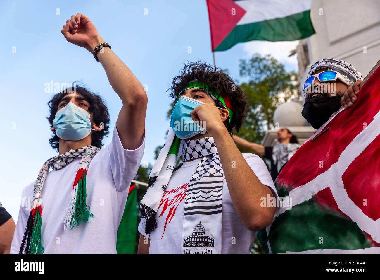 Washington, DC, USA. 15th May, 2021. Pictured: Young men cheer for ...