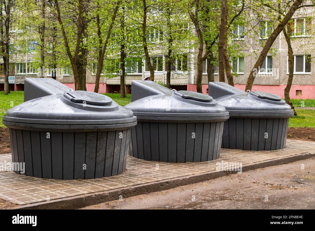 Large street trash cans in the park close up Stock Photo - Alamy