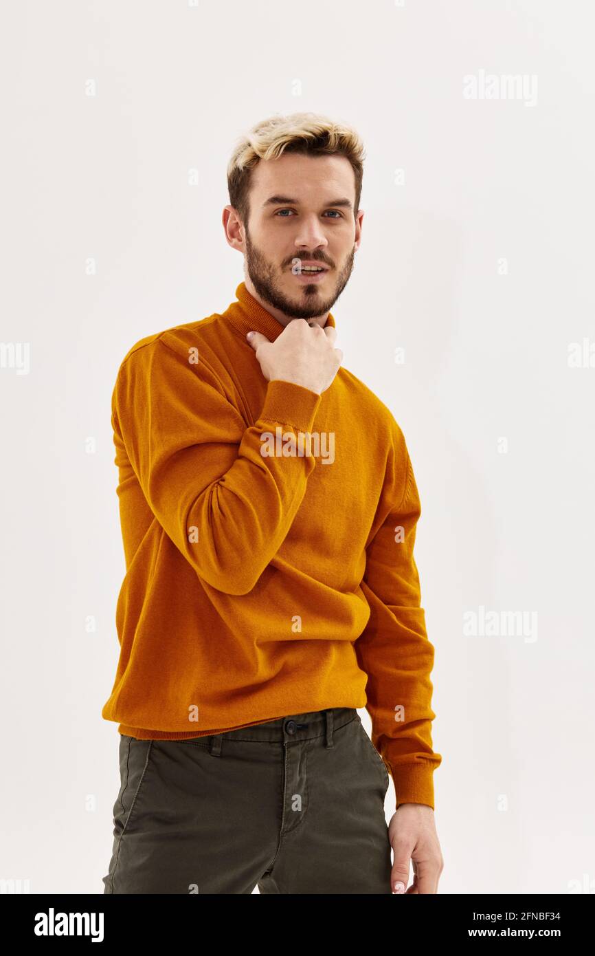 attractive man holding collar autumn style fashion light background ...