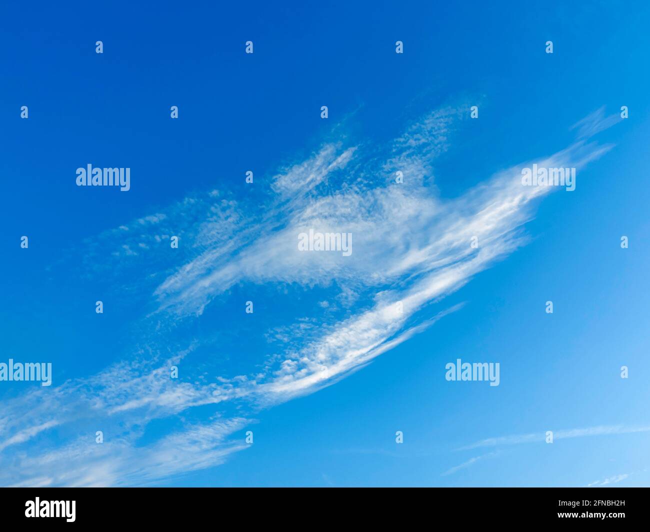 Cloud in the shape of an angle well possible Stock Photo - Alamy