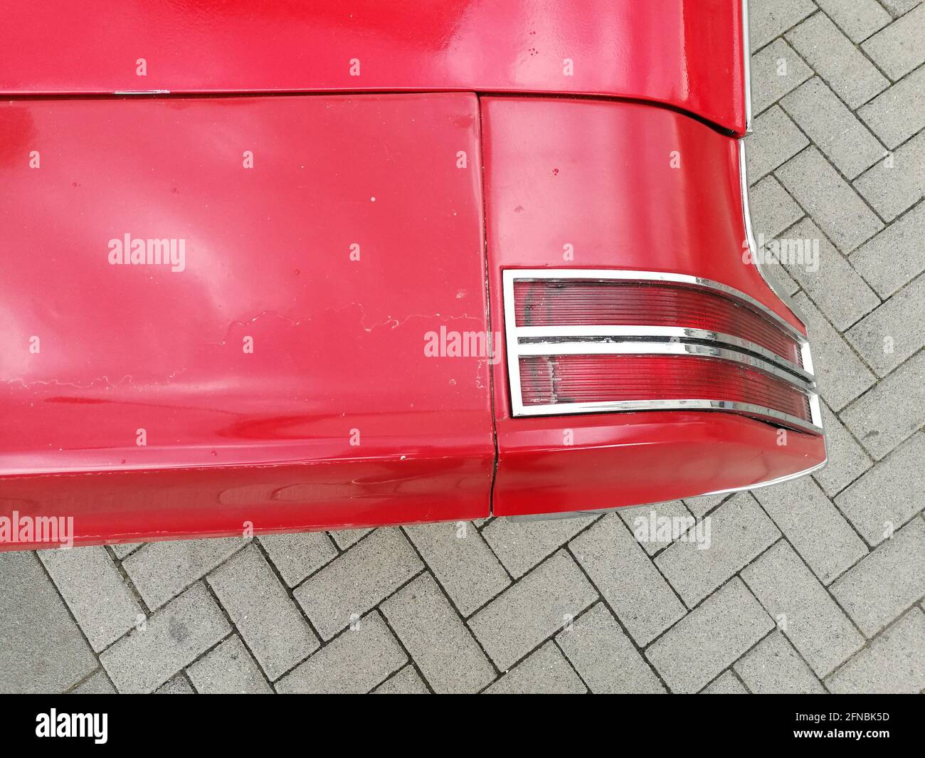 A top view of a red retro car rear bumper and backlight Stock Photo - Alamy