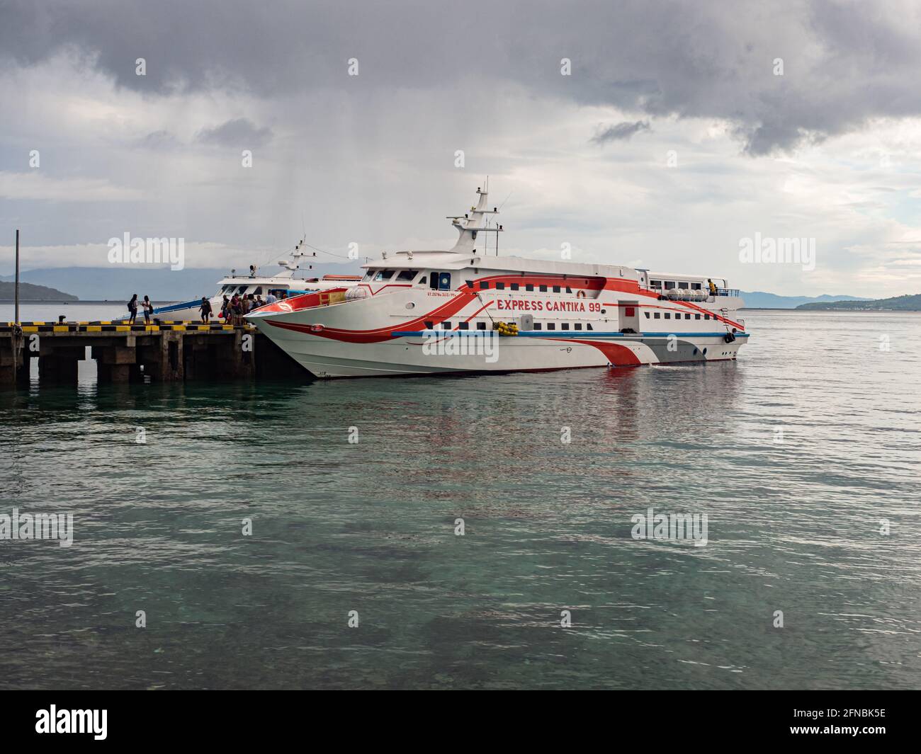 Ambon, Indonesia - February 15, 2018: A boat floating between the ...