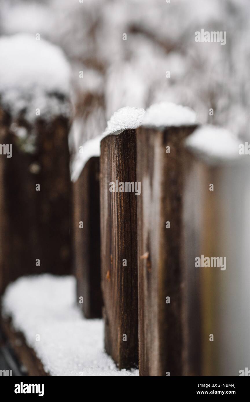 Snow covered wooden gate hi-res stock photography and images - Alamy