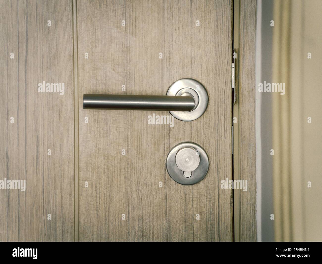 Hand closing house entrance wooden door hi-res stock photography and ...