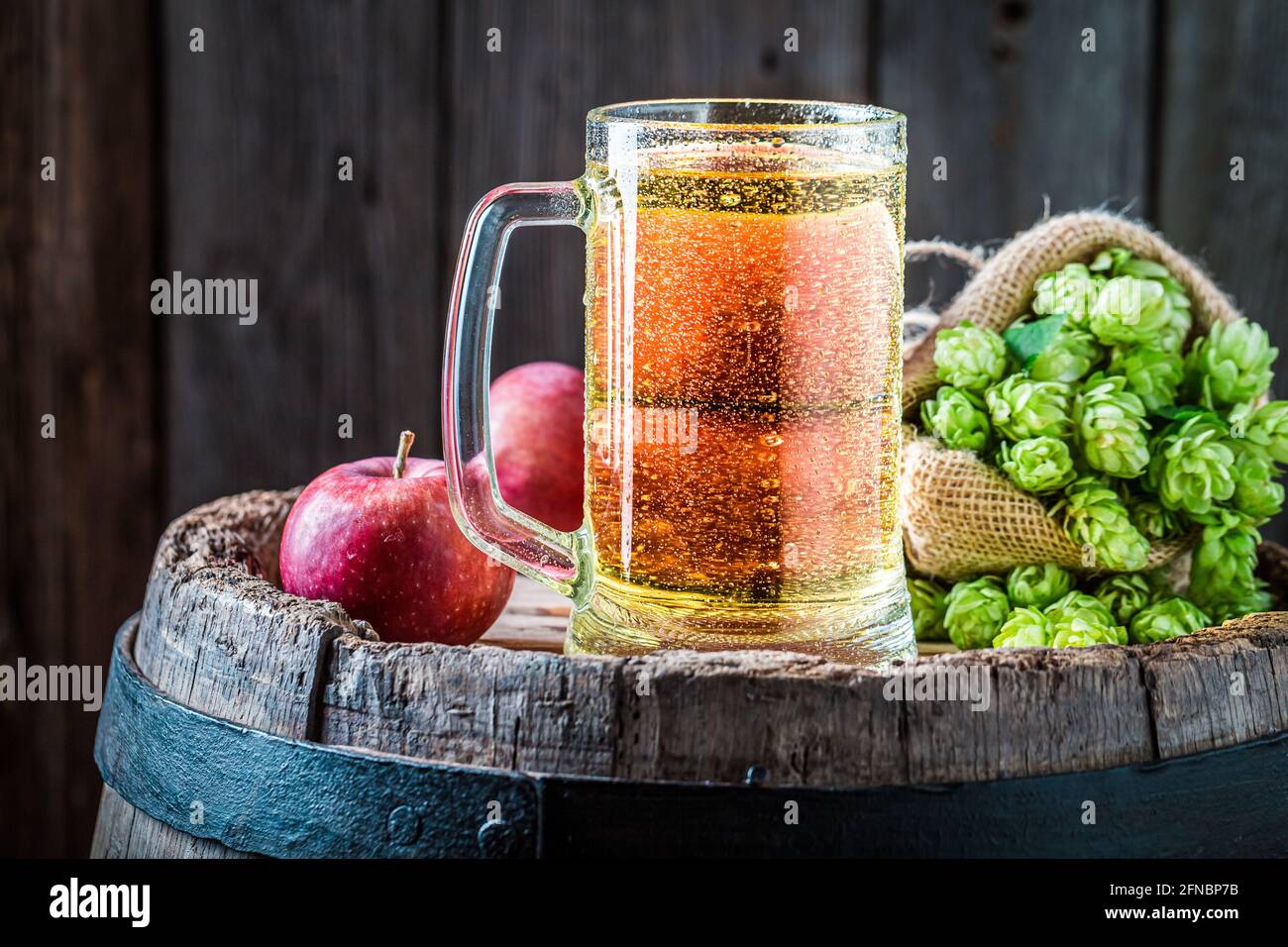 Closeup of cider beer made of apples with bubbles. Brewing industry ...