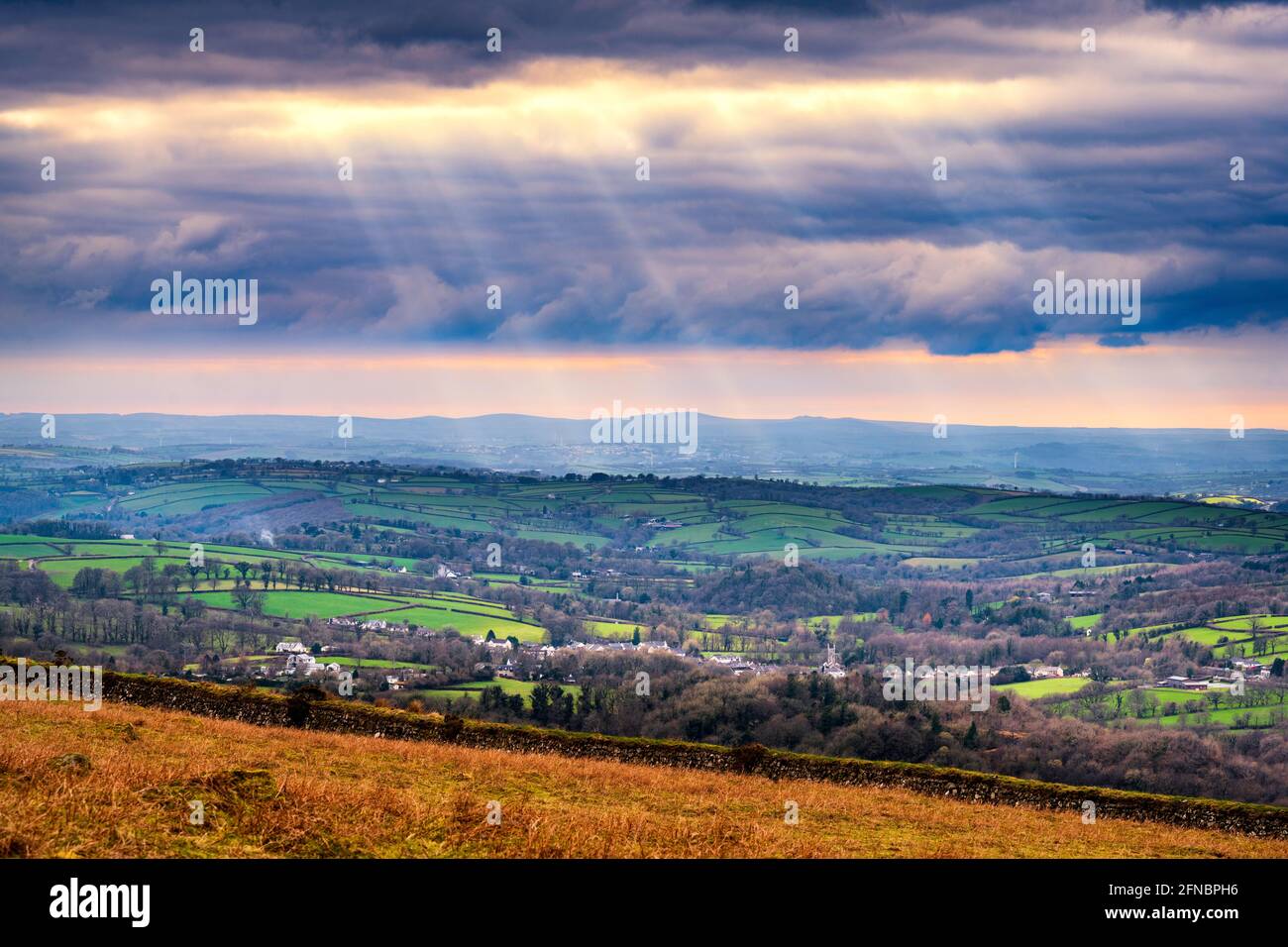 Dramatic view with crepuscular rays, looking west towards Bridestowe ...