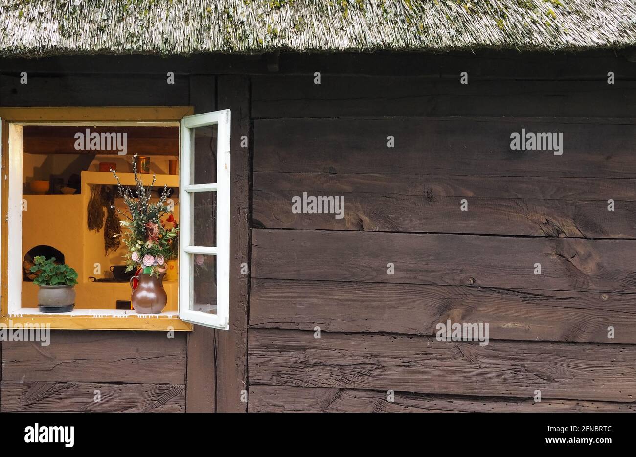 old country window with flowers in a vase Stock Photo - Alamy