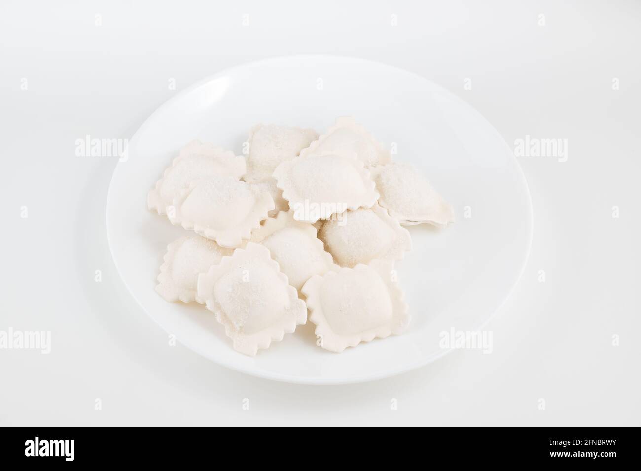 frozen dumpling covered with frost isolated on white background Stock ...