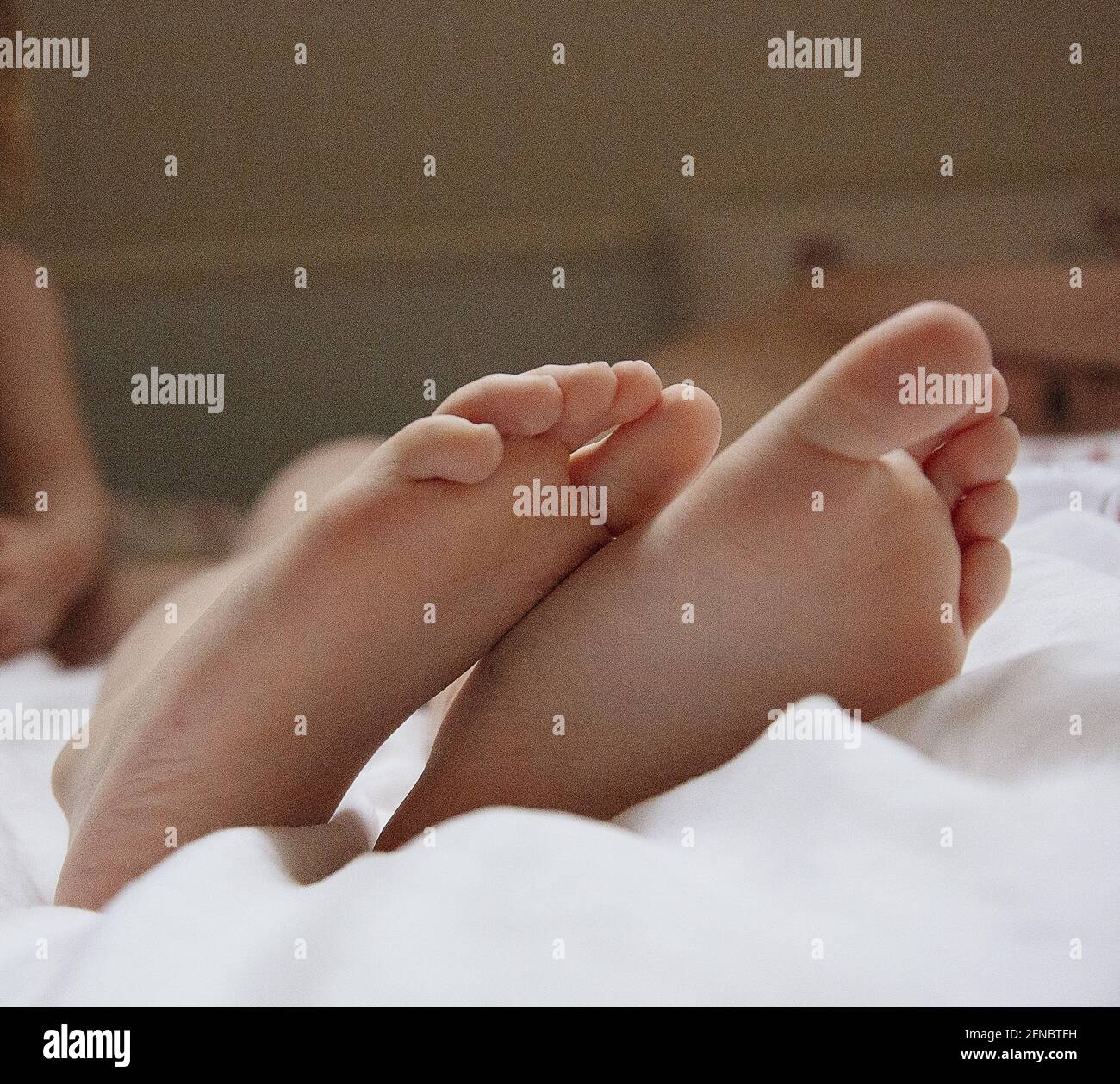 Soles of feet child hi-res stock photography and images - Alamy