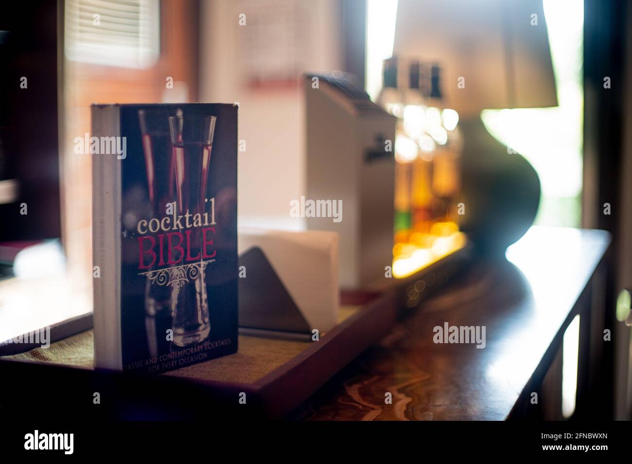 cocktail bible book guide kept at the counter of a bar pub in india ...