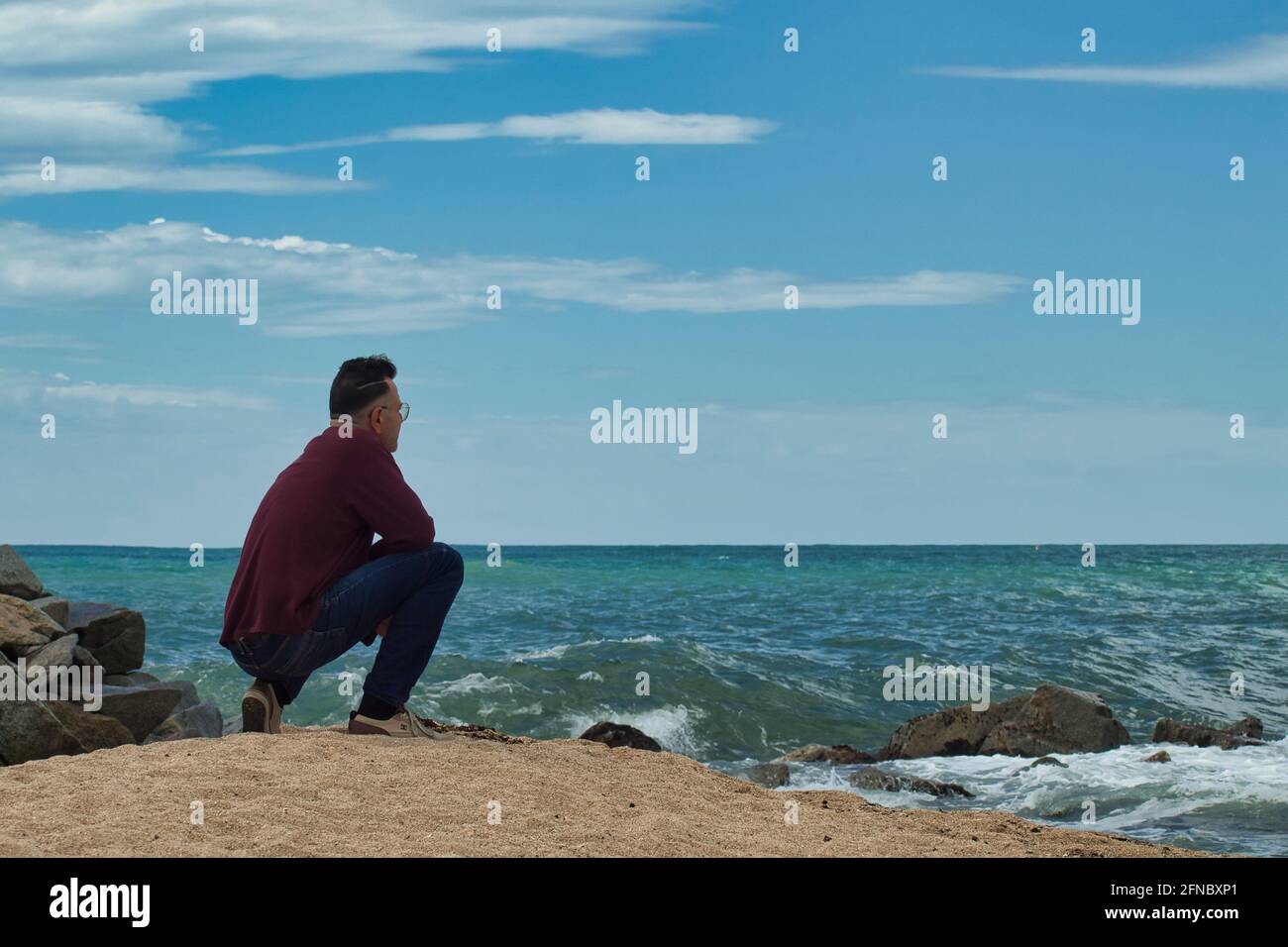 Man from behind on the beach hi-res stock photography and images - Alamy