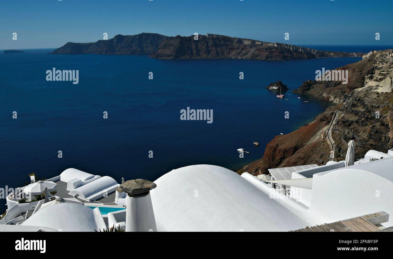 Scenic landscape with typical Cycladic architecture houses overlooking ...