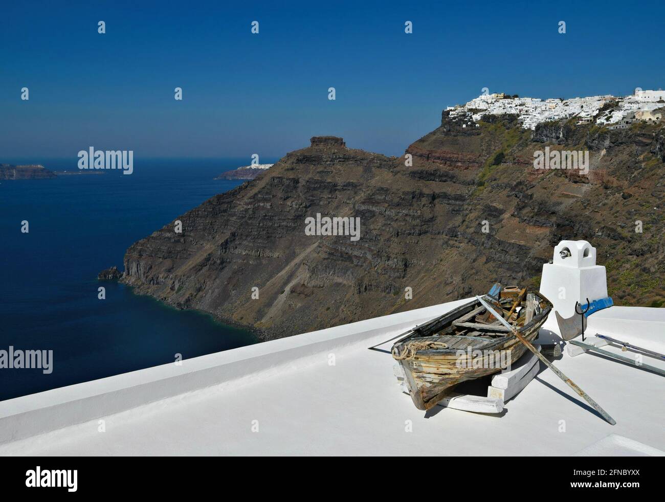 Scenic landscape with an old traditional Greek fishing boat on the ...