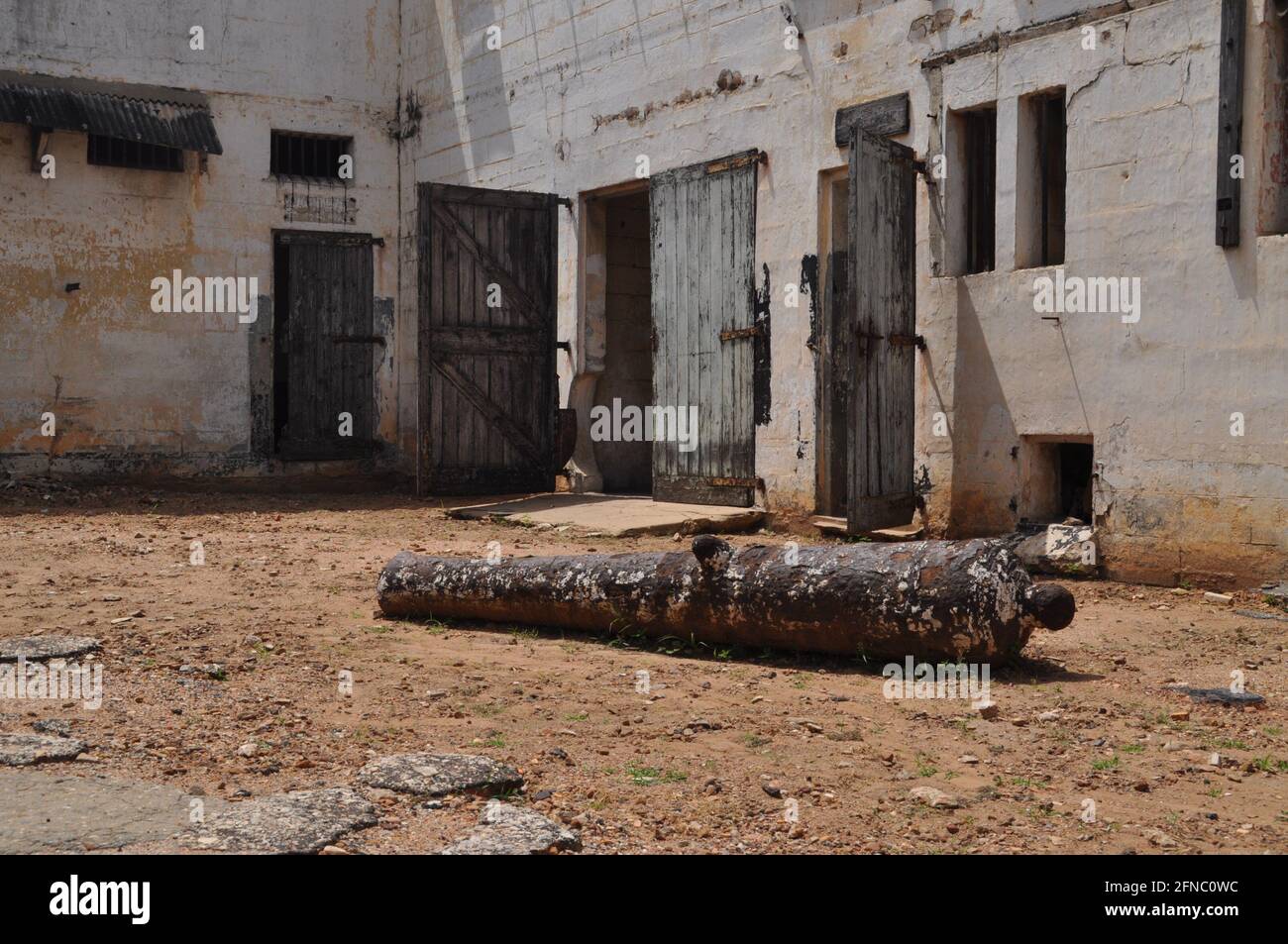 An ancient cannon in the abandoned prison in the former Ussher Fort in ...
