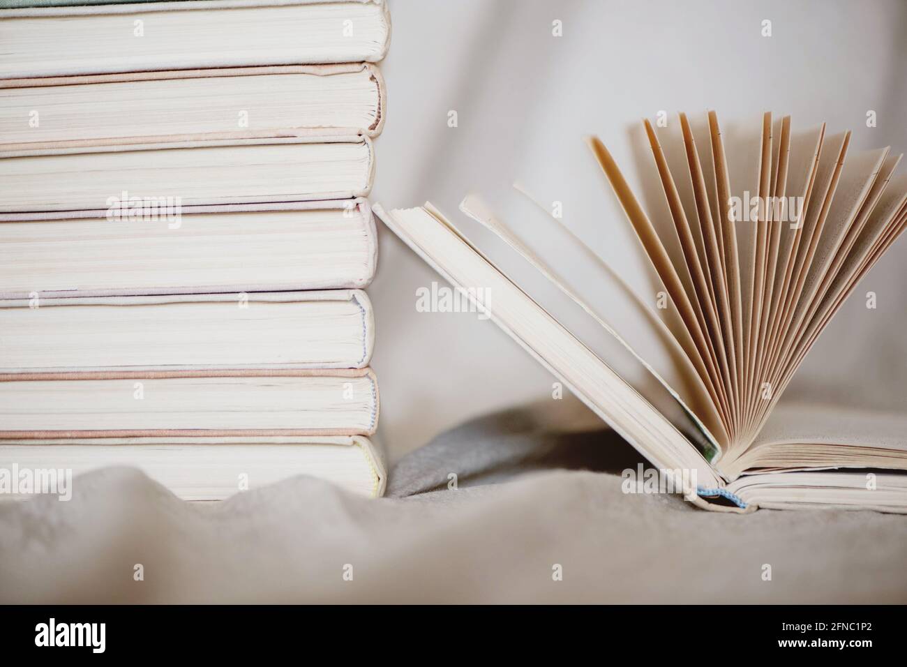 Pile of books open book hi-res stock photography and images - Alamy