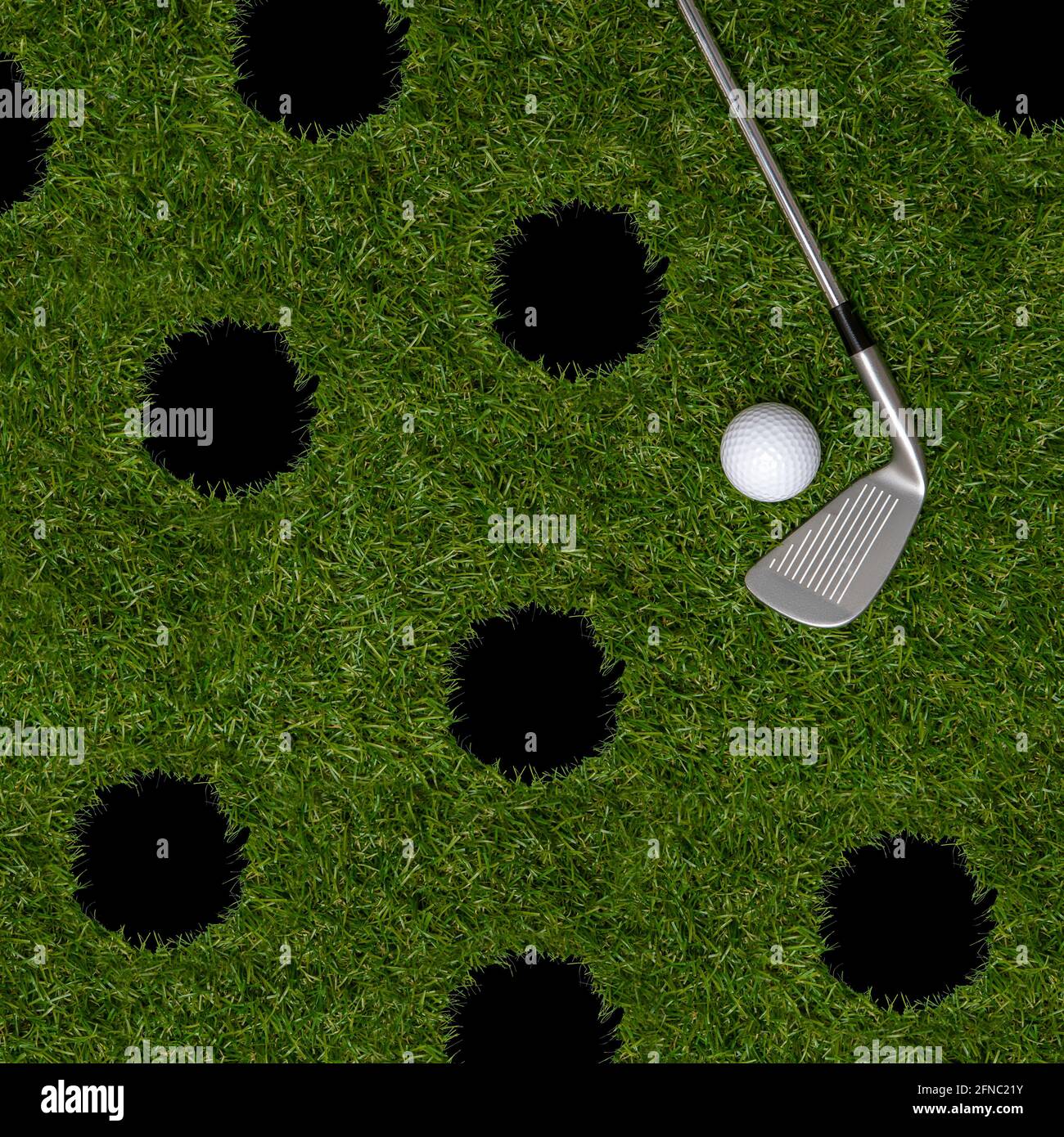 White golf ball, holes and stick on green grass. Horizontal sport ...