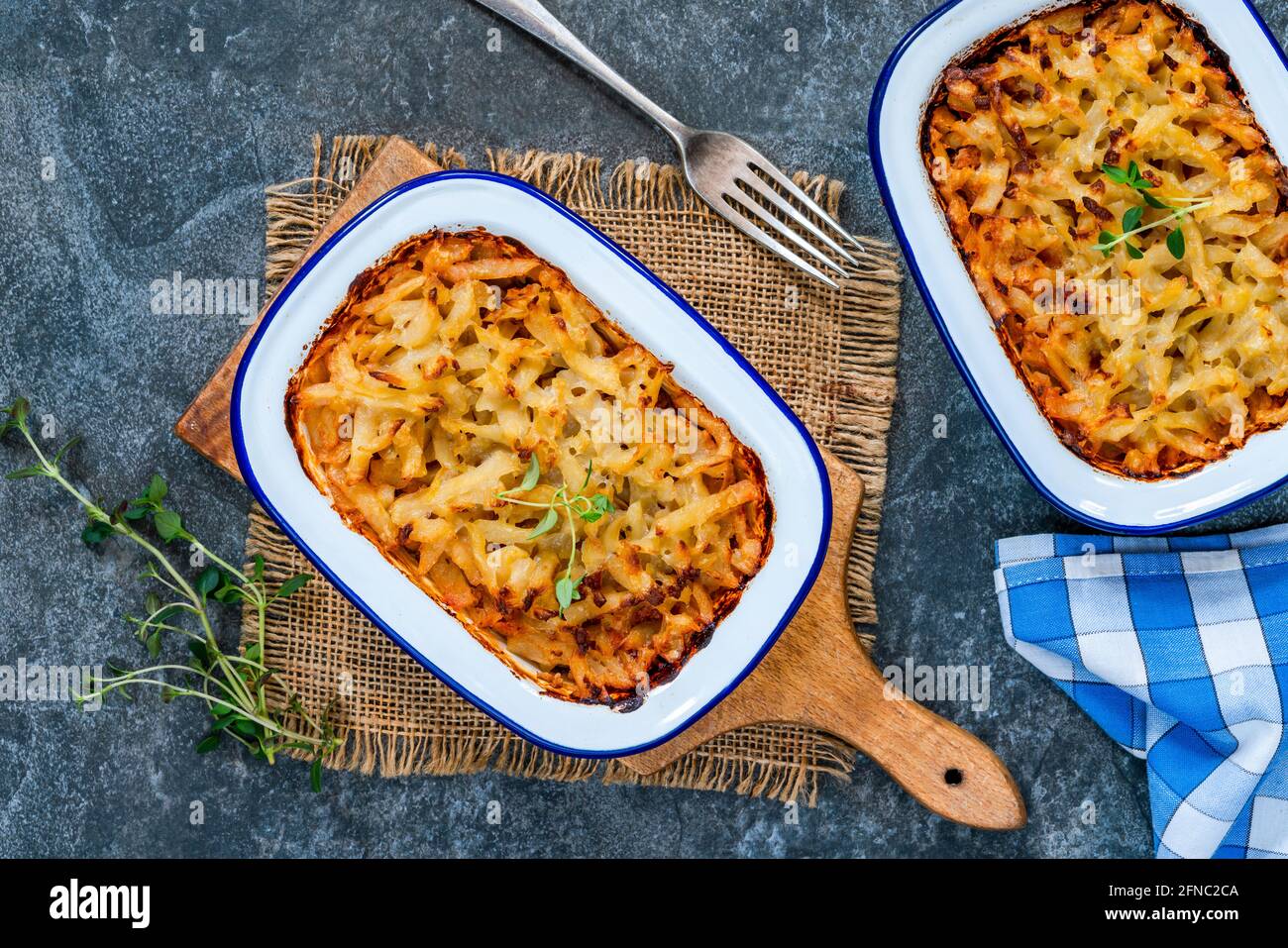Pork, mushroom and thyme bake topped with potato rosti - overhead view ...