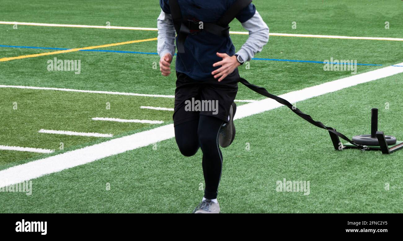 People dragging a sled hi-res stock photography and images - Alamy