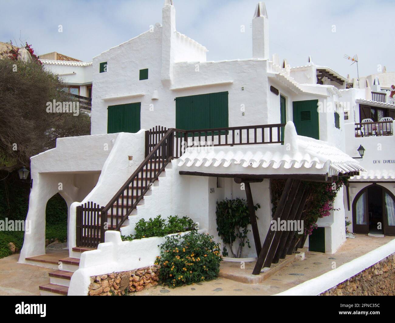 Menorca, Spain - June 23 2006: Typical Spanish whitewashed beach houses ...
