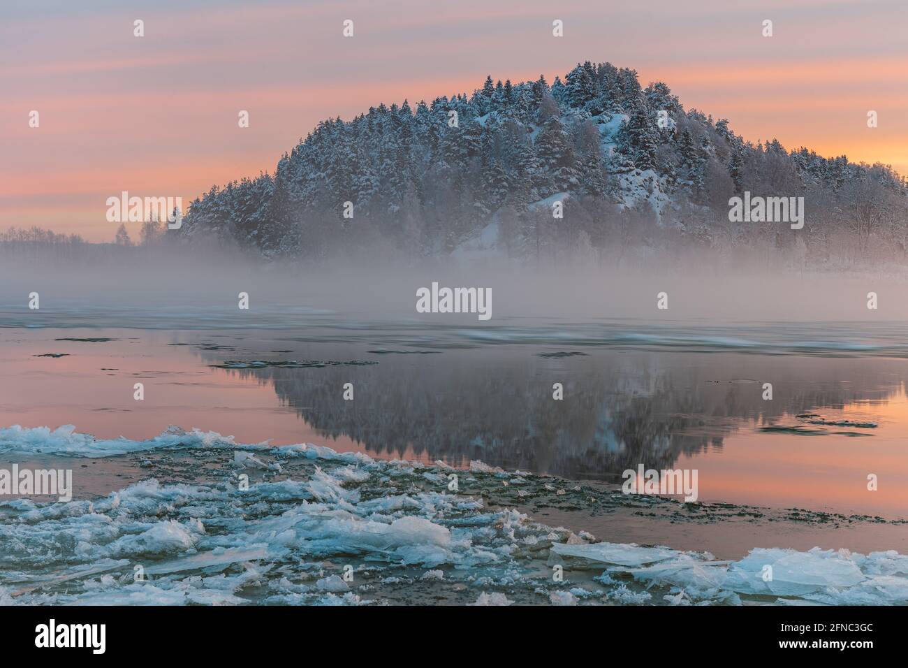 Ice and mist at river Stock Photo - Alamy