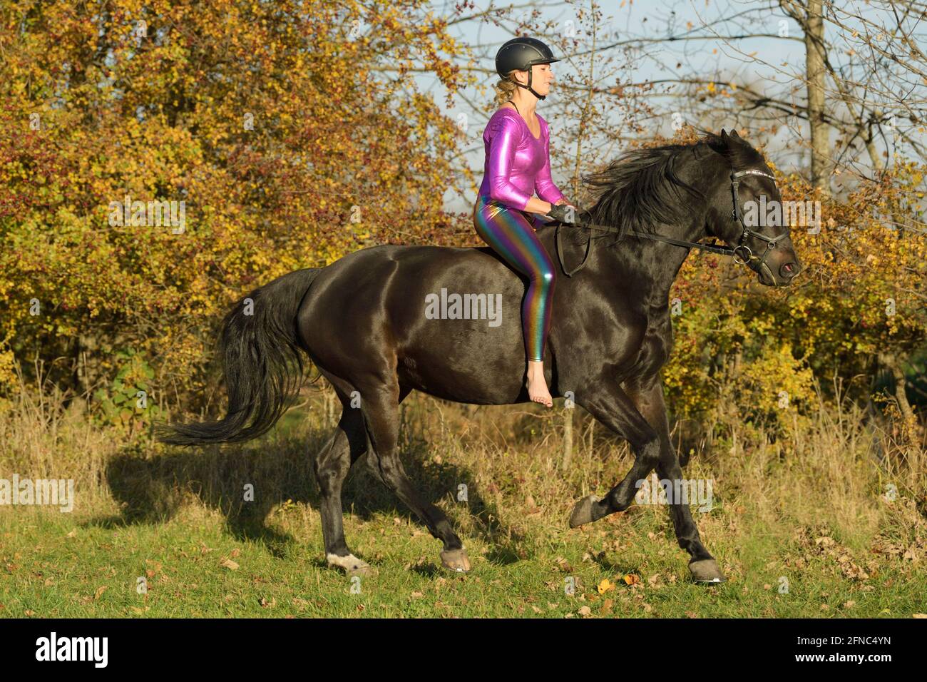 Rider wearing a very special colorful outfit, just for having fun Stock ...
