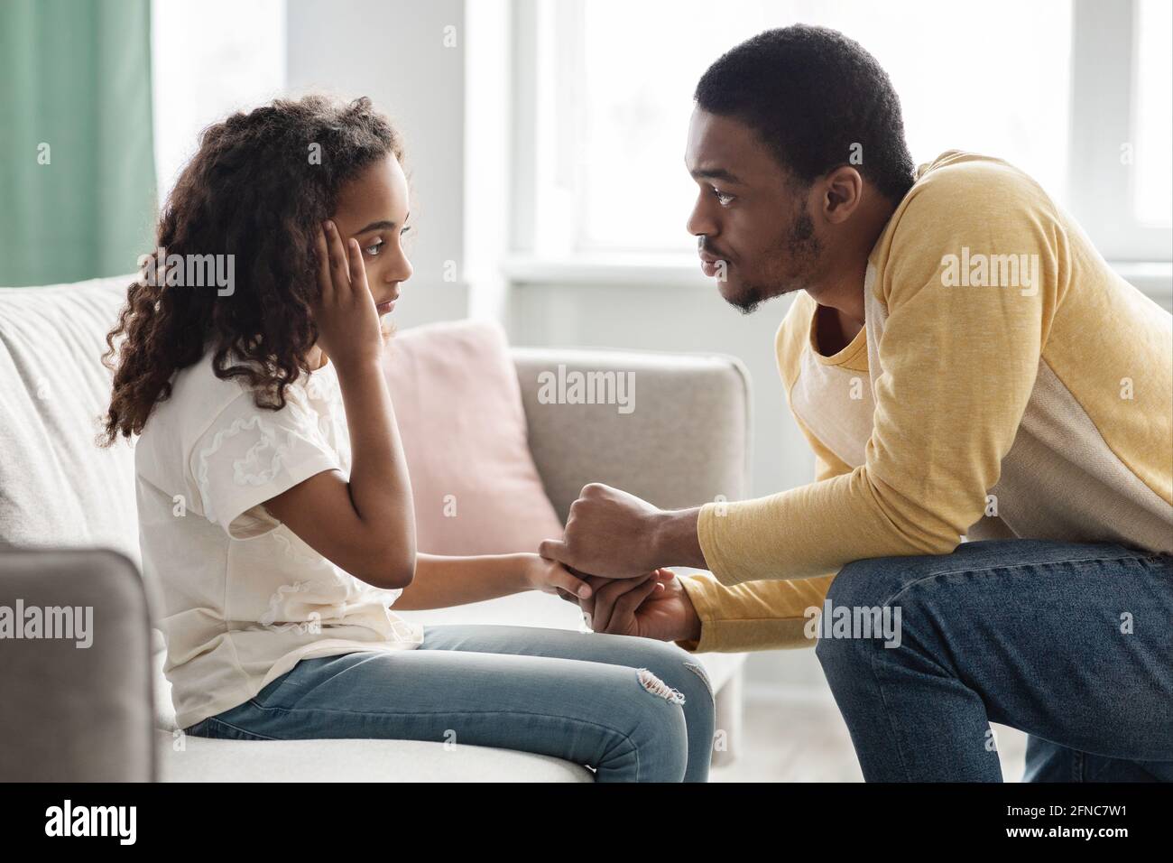 Father comforting daughter hi-res stock photography and images - Alamy