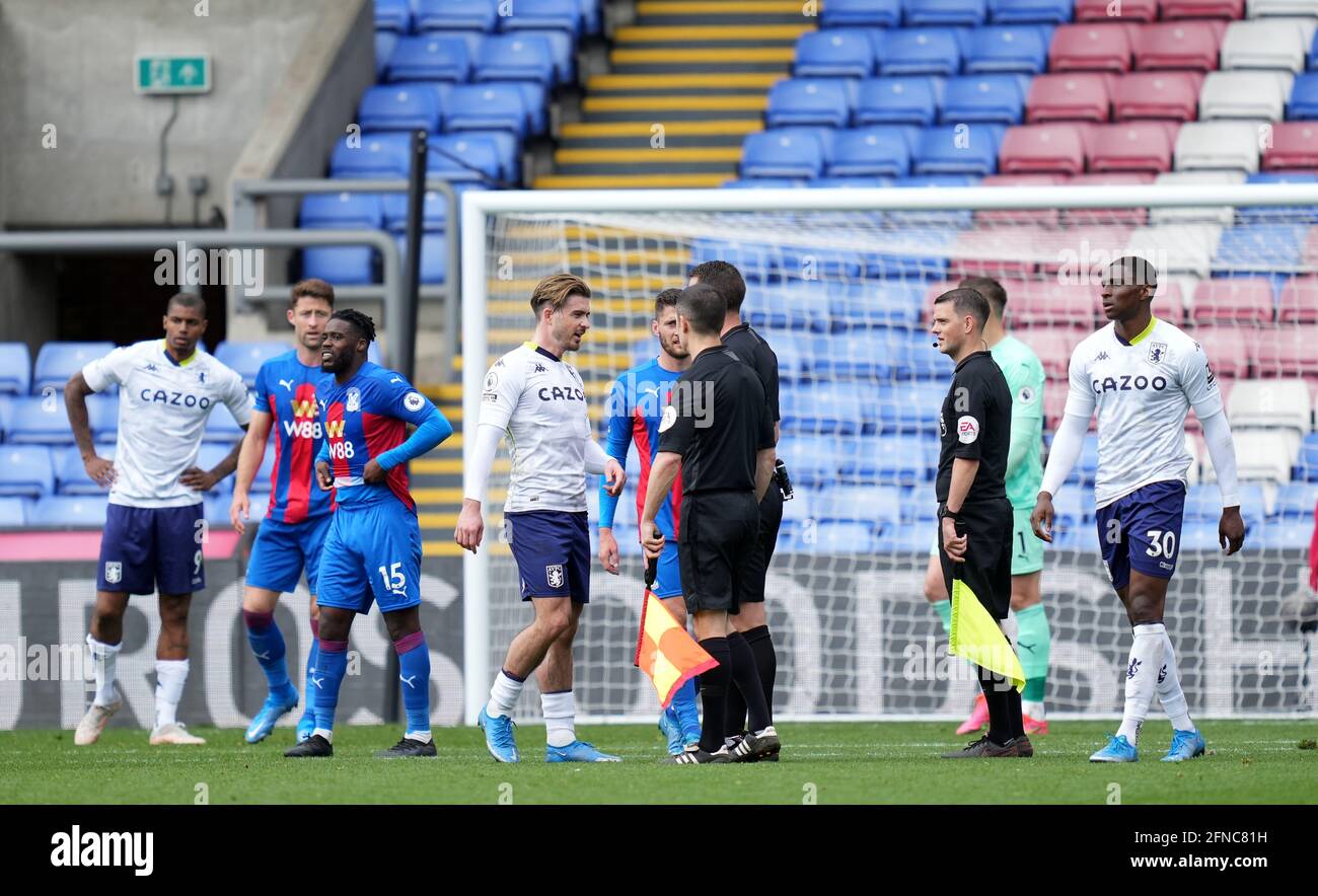 Aston Villa's Jack Grealish (centre) speaks to referee David Coot after ...