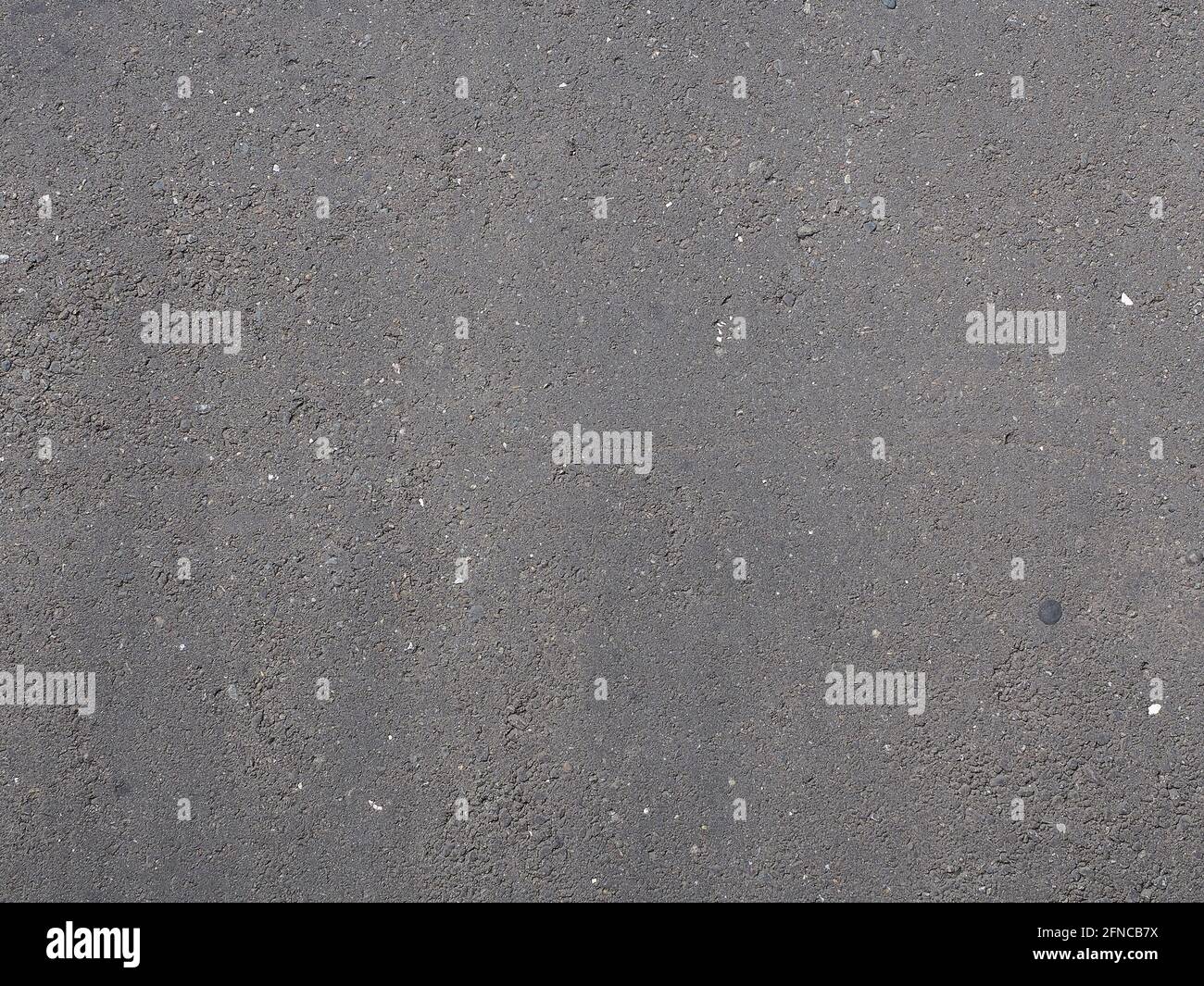 Dark gray rough asphalt surface. Full screen photo Stock Photo - Alamy