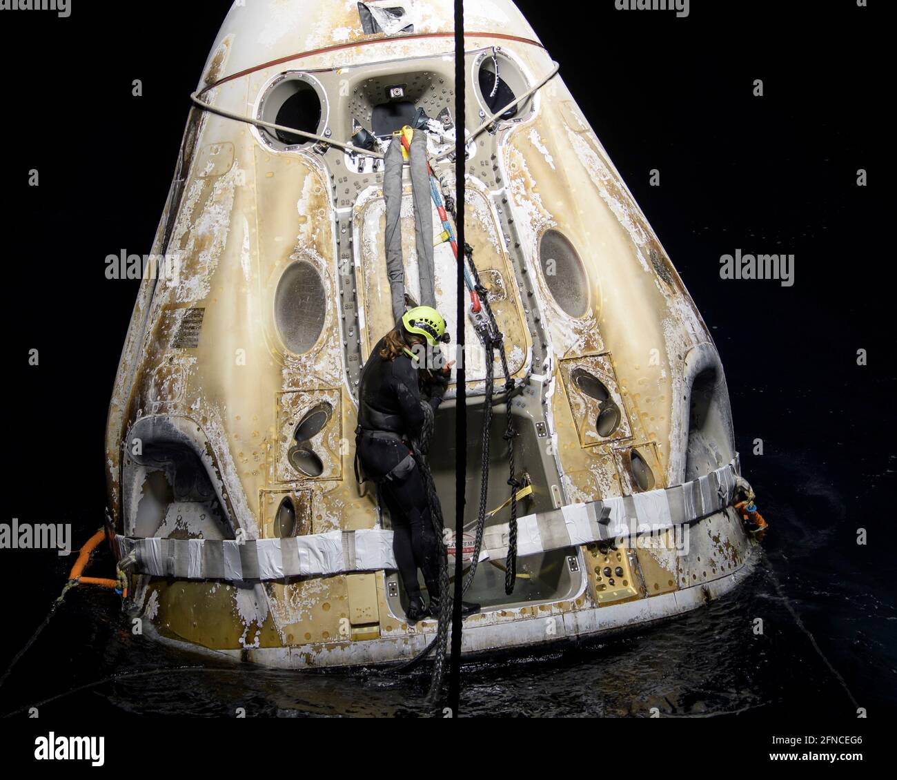 Support teams work to secure the SpaceX Crew Dragon Resilience ...