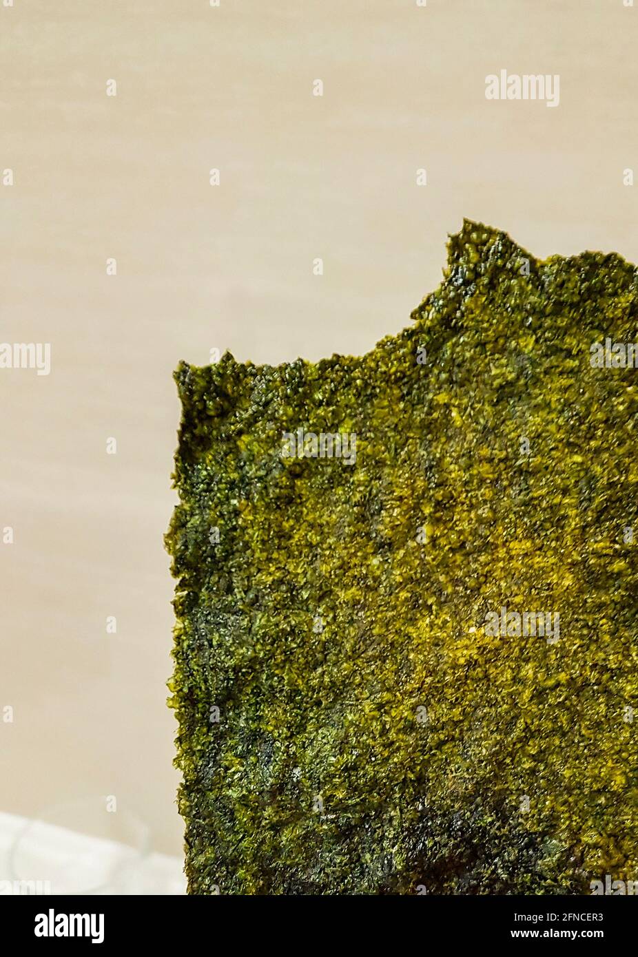 Thai seaweed instant snack unpacked hold in the hand in Thailand Stock ...