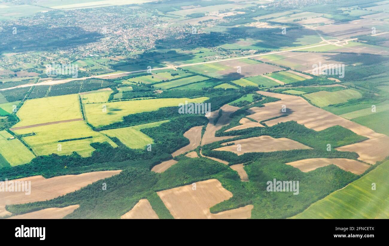 Fields and meadows, view from the window of airplane Stock Photo - Alamy