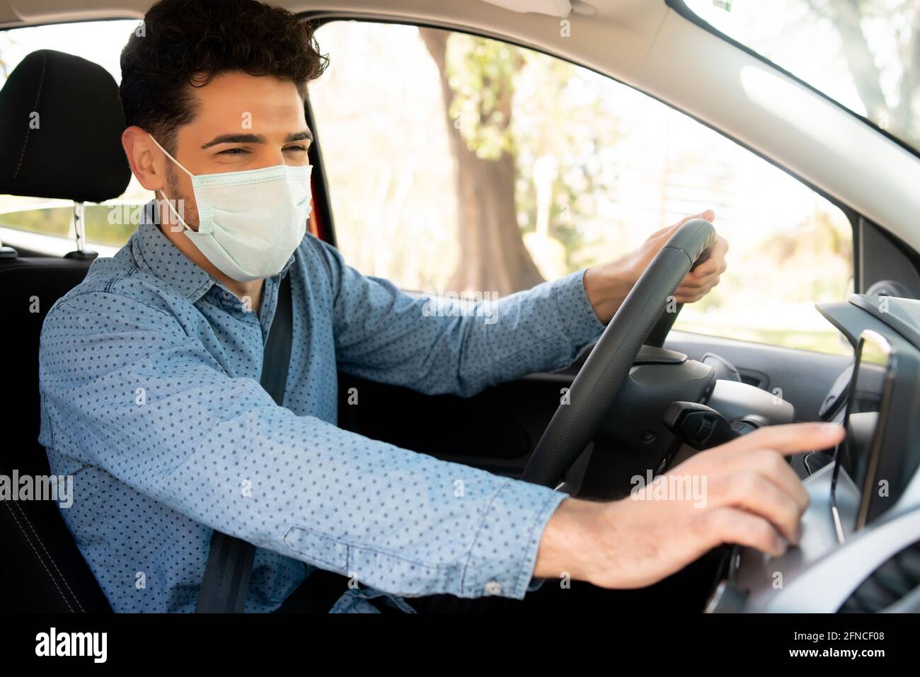 Man using gps navigation system in car Stock Photo - Alamy