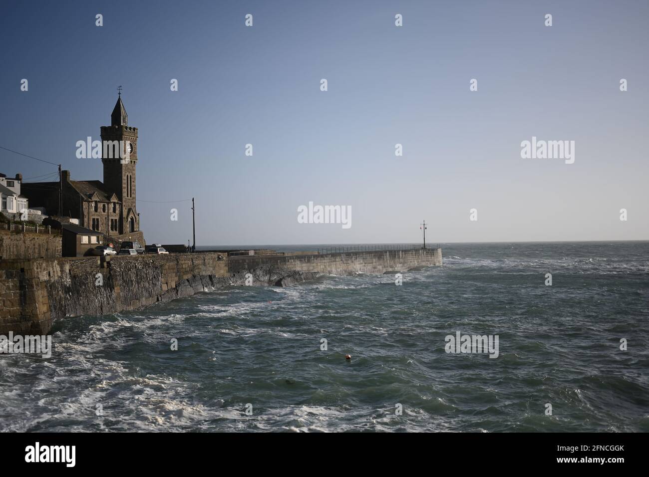 waterfront church and sea wall at Port Isaac, a typical Cornish fishing ...