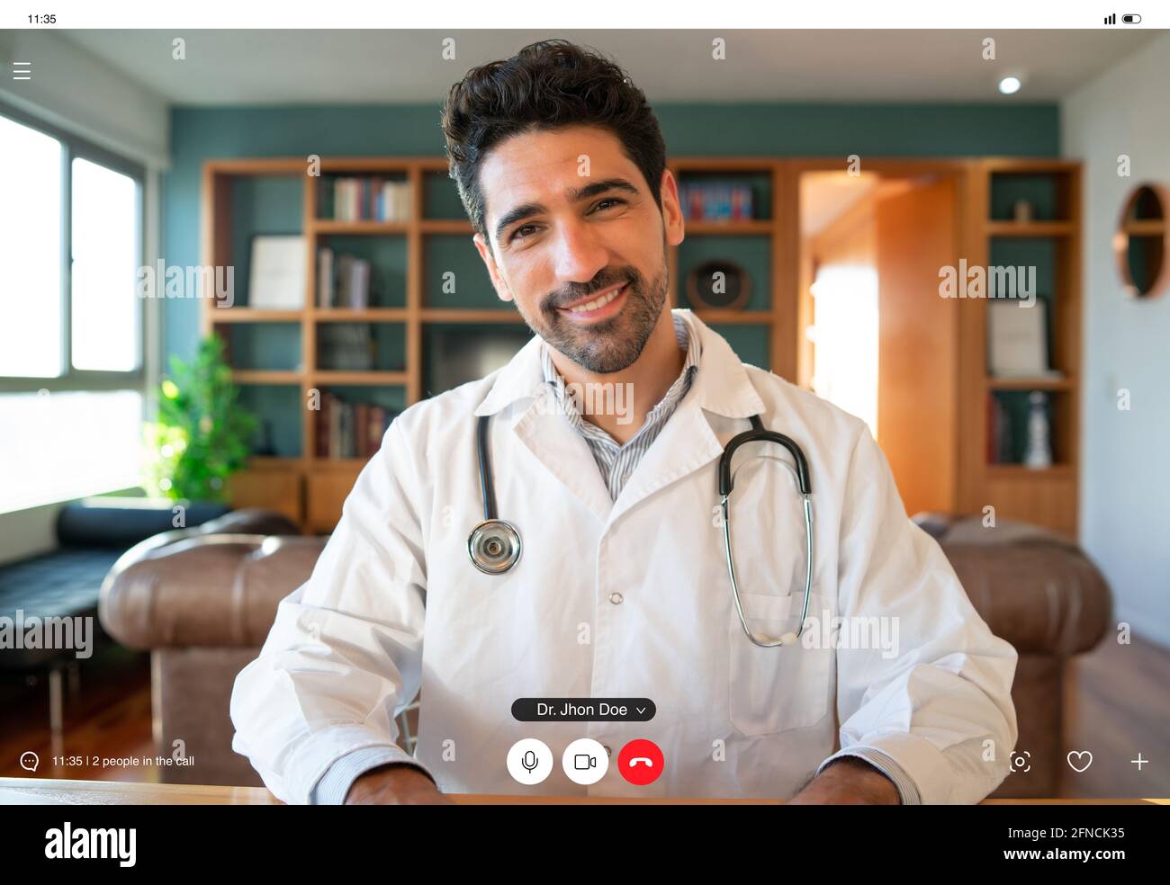 Doctor on a video call with a patient Stock Photo - Alamy