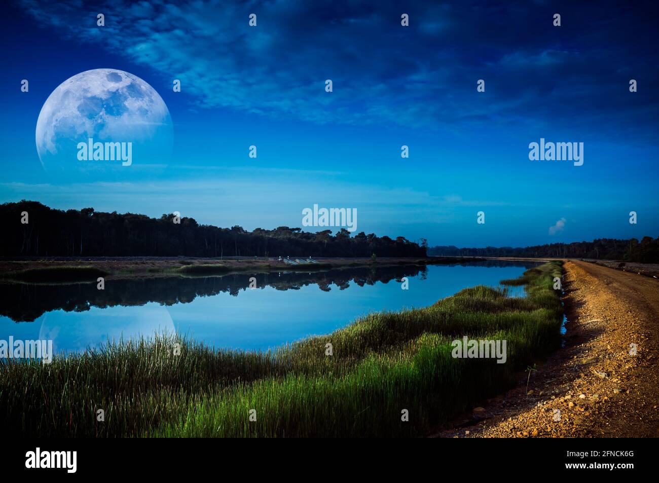 Beautiful landscape of blue sky with cloud and fade half super moon ...