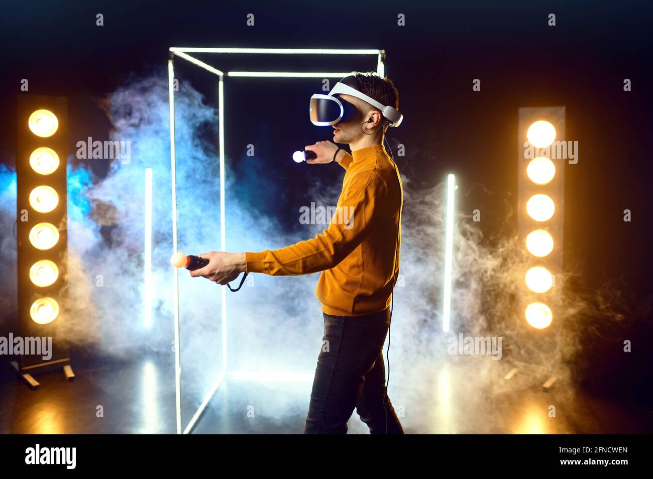 Male gamer using virtual reality headset Stock Photo - Alamy