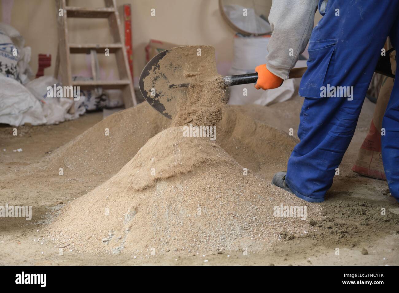 Construction worker preparing cement. Man bricklaying. Mason laying ...