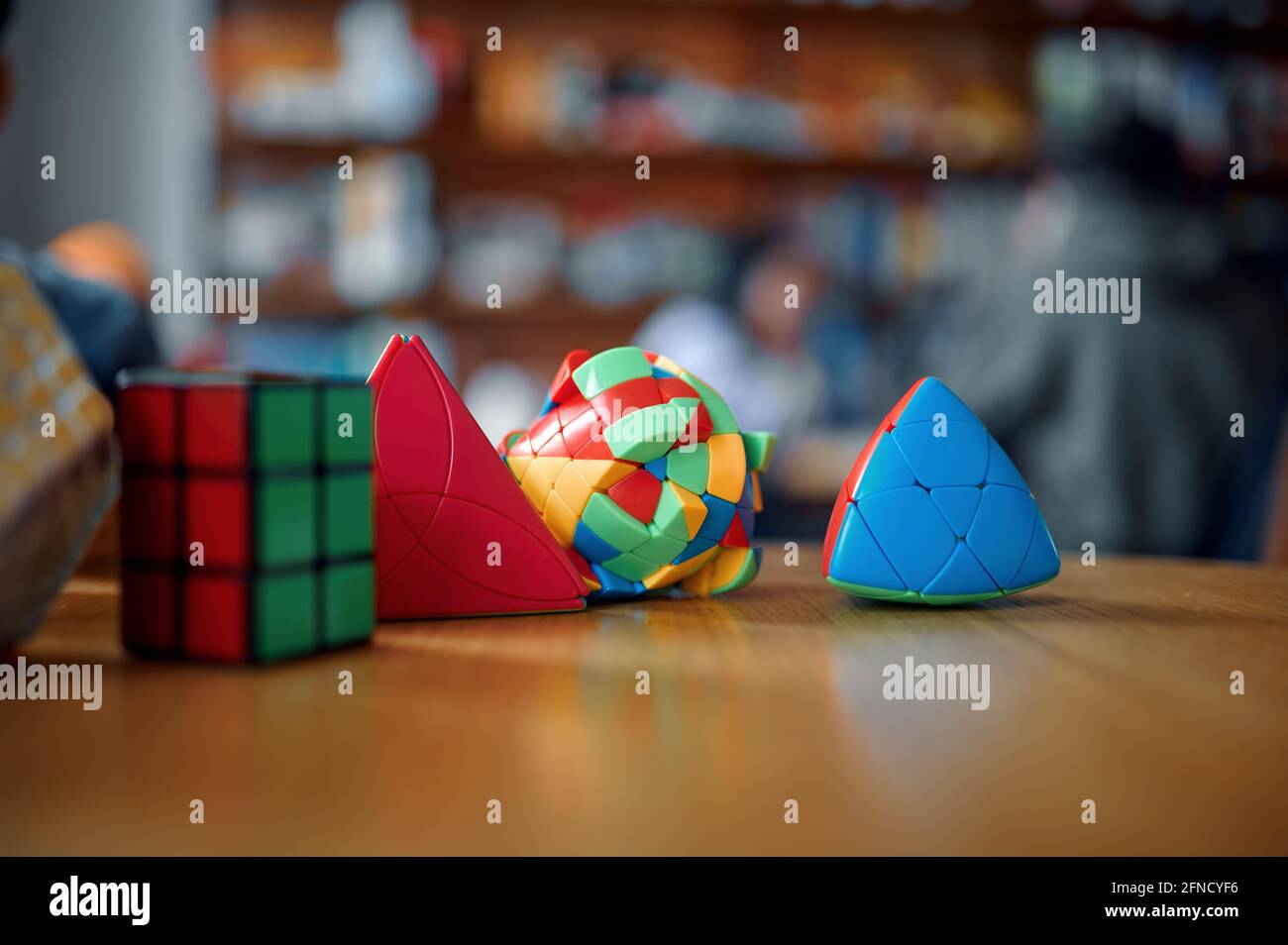 Different colorful puzzle cubes on table, nobody Stock Photo - Alamy